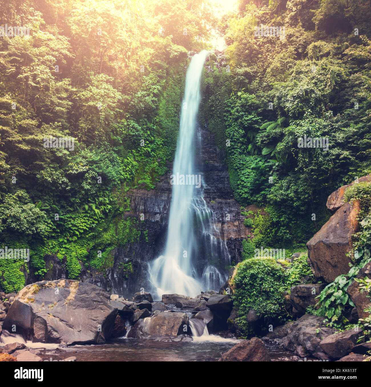 Waterfall in Indonesian jungle Stock Photo - Alamy