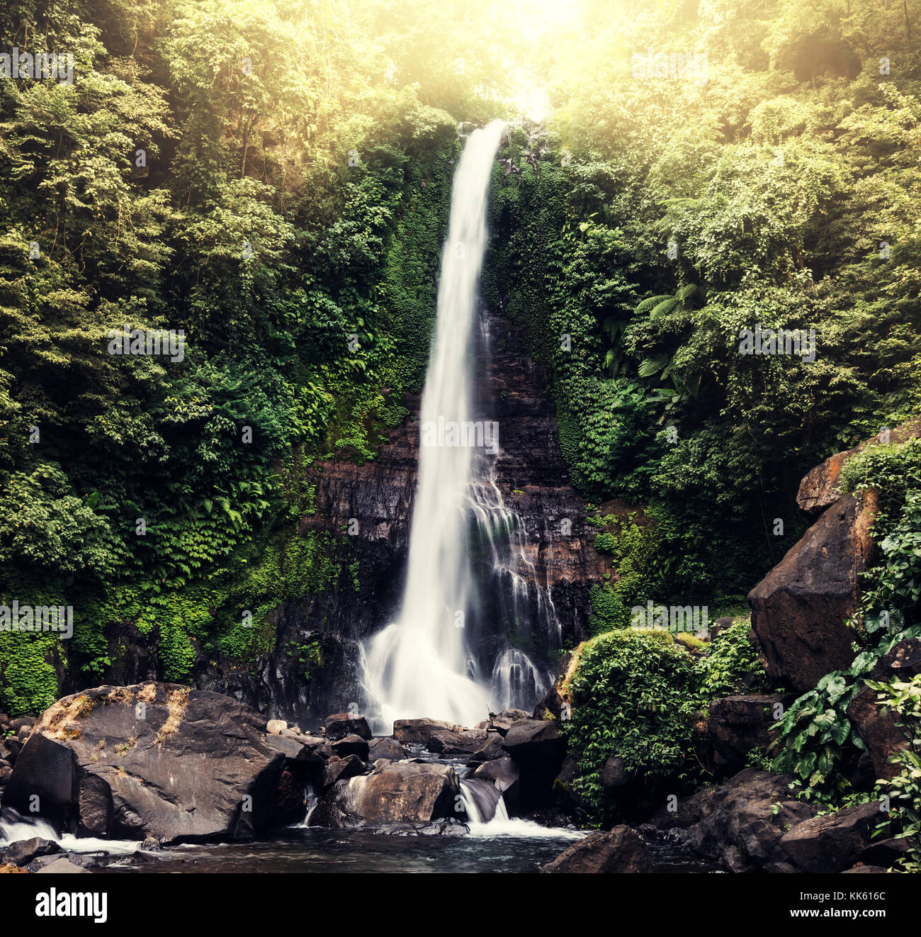Waterfall in Indonesian jungle Stock Photo - Alamy