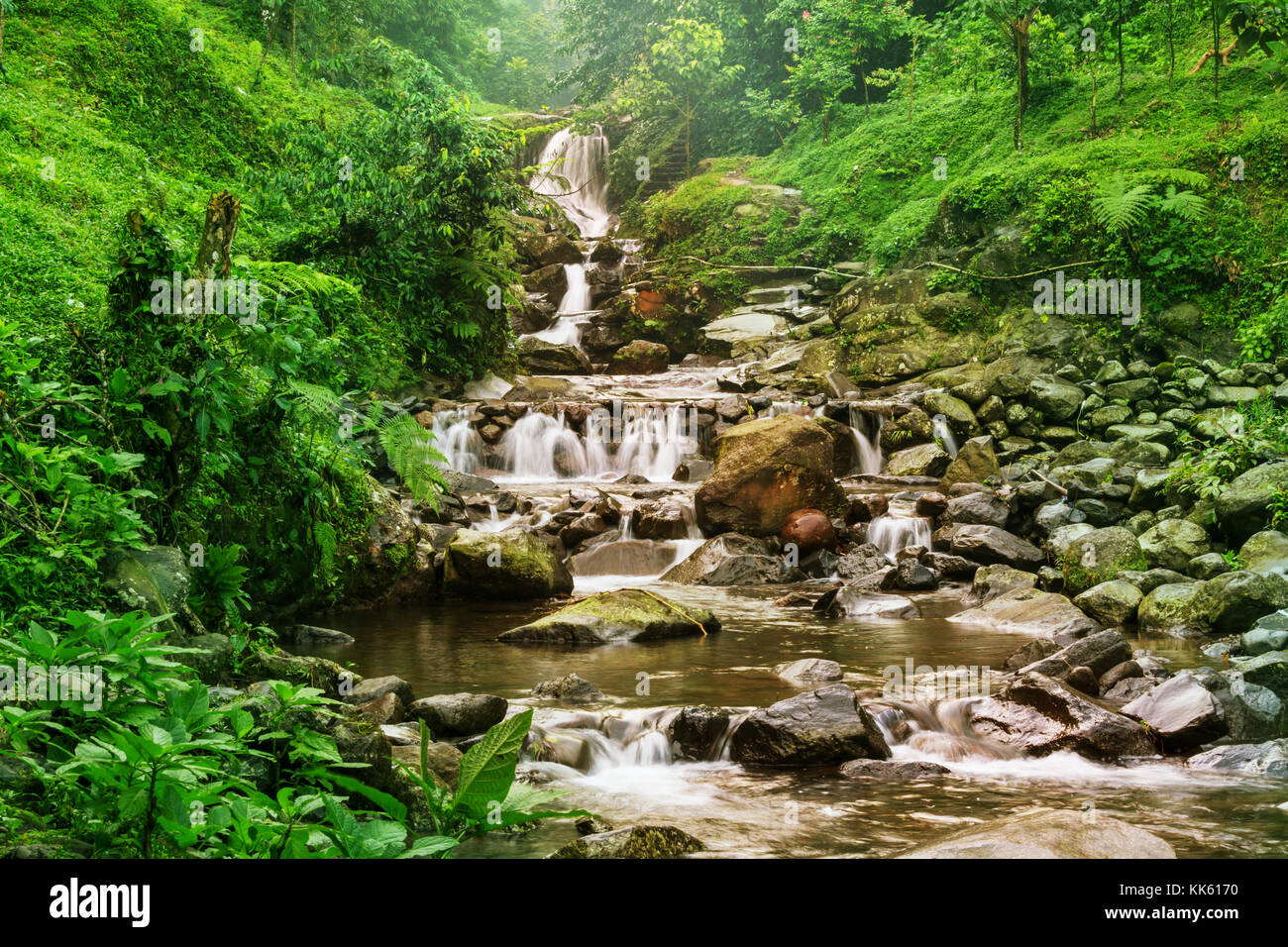 Waterfall in Indonesian jungle Stock Photo - Alamy
