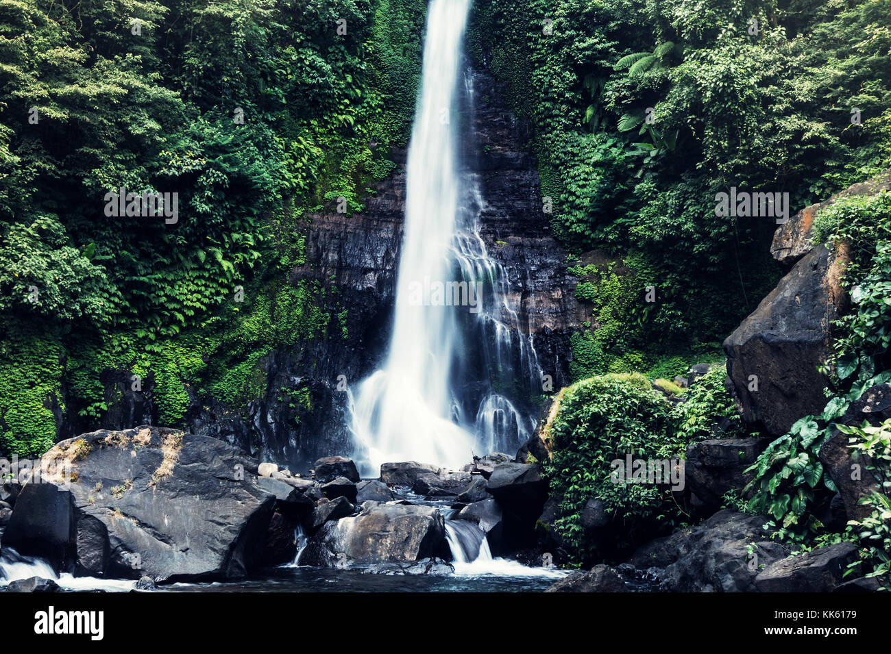 Waterfall in Indonesian jungle Stock Photo - Alamy