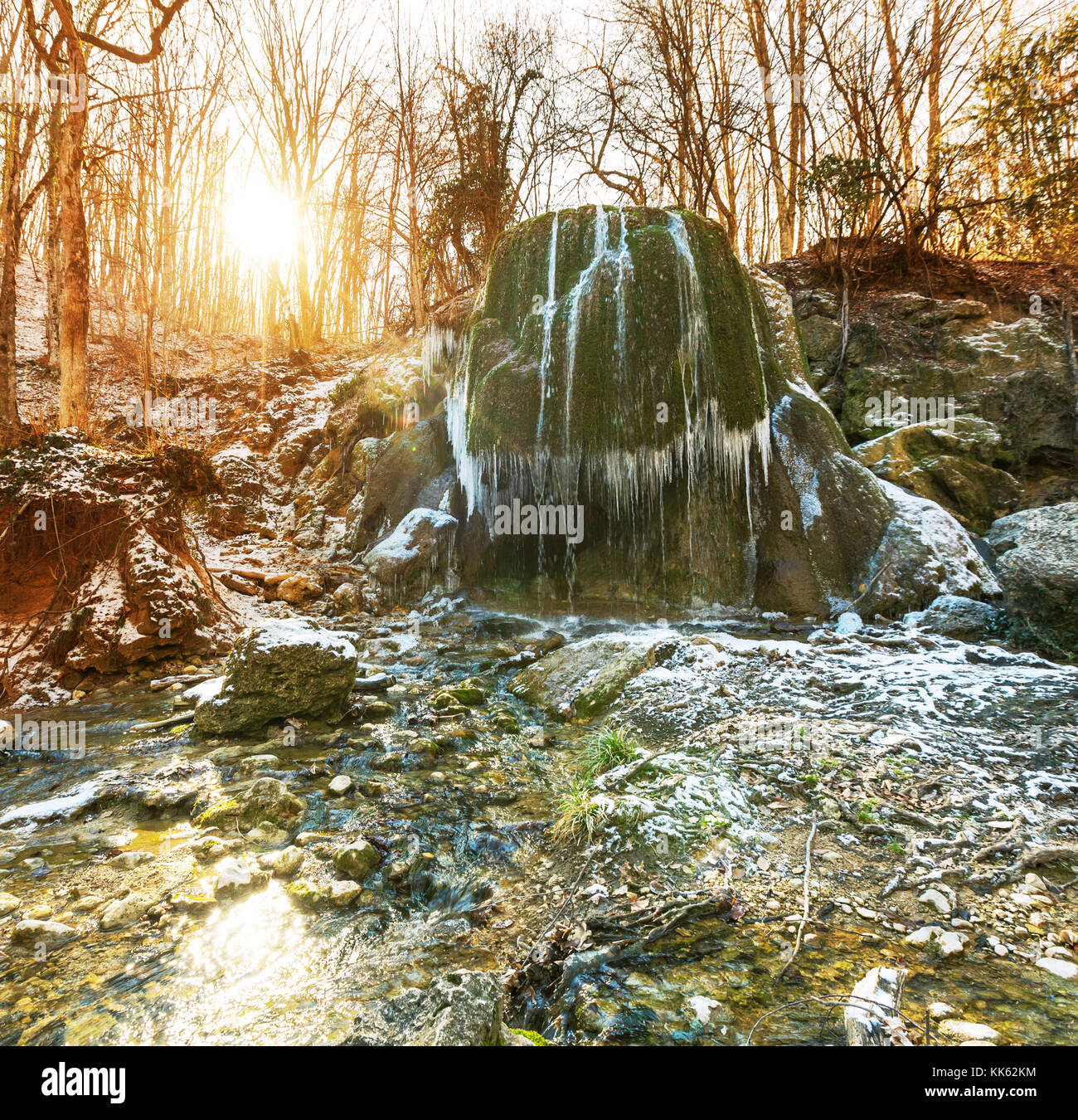 Waterfall in spring forest Stock Photo - Alamy
