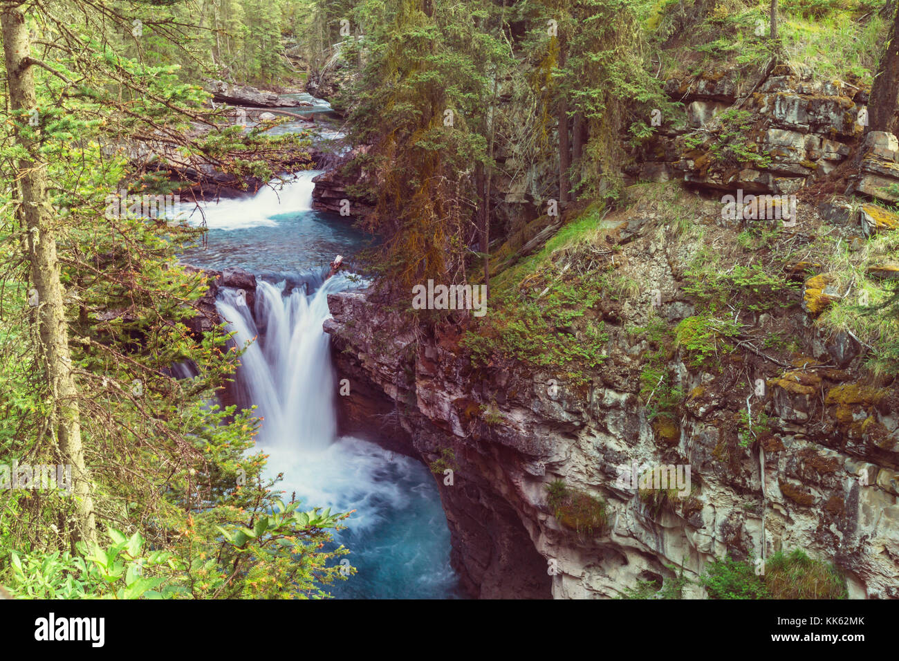 Waterfall movement in the stone Stock Photo - Alamy