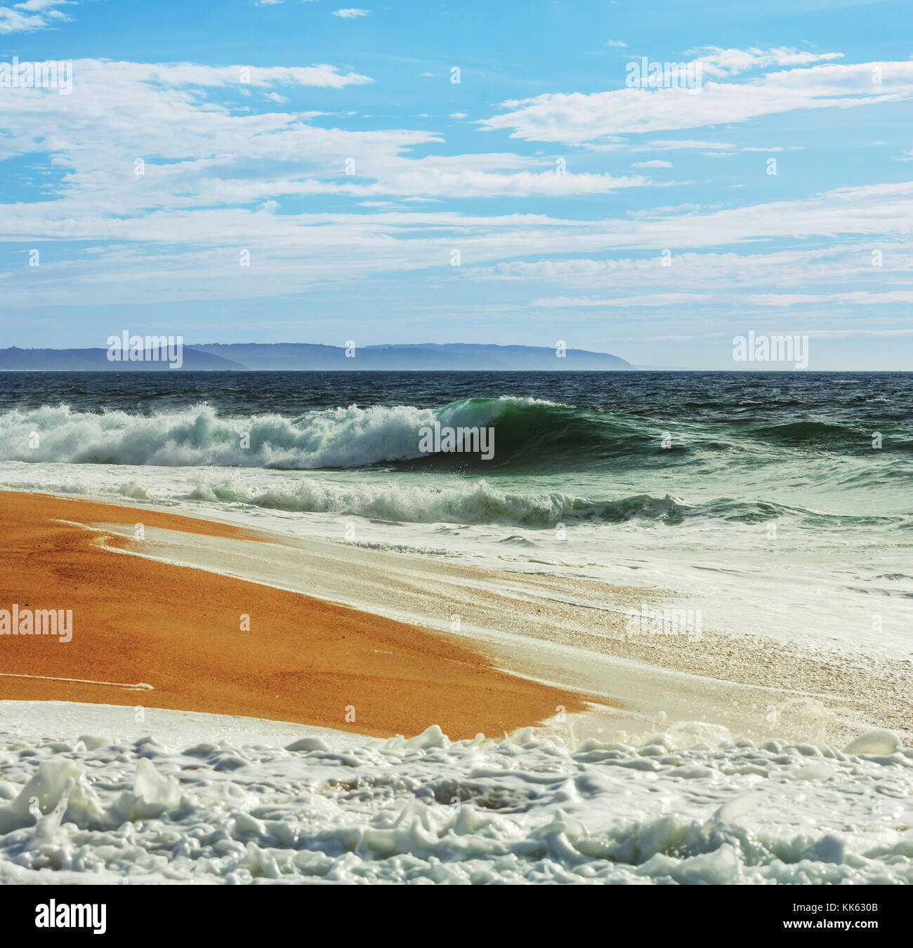 Wave on the beach Stock Photo - Alamy