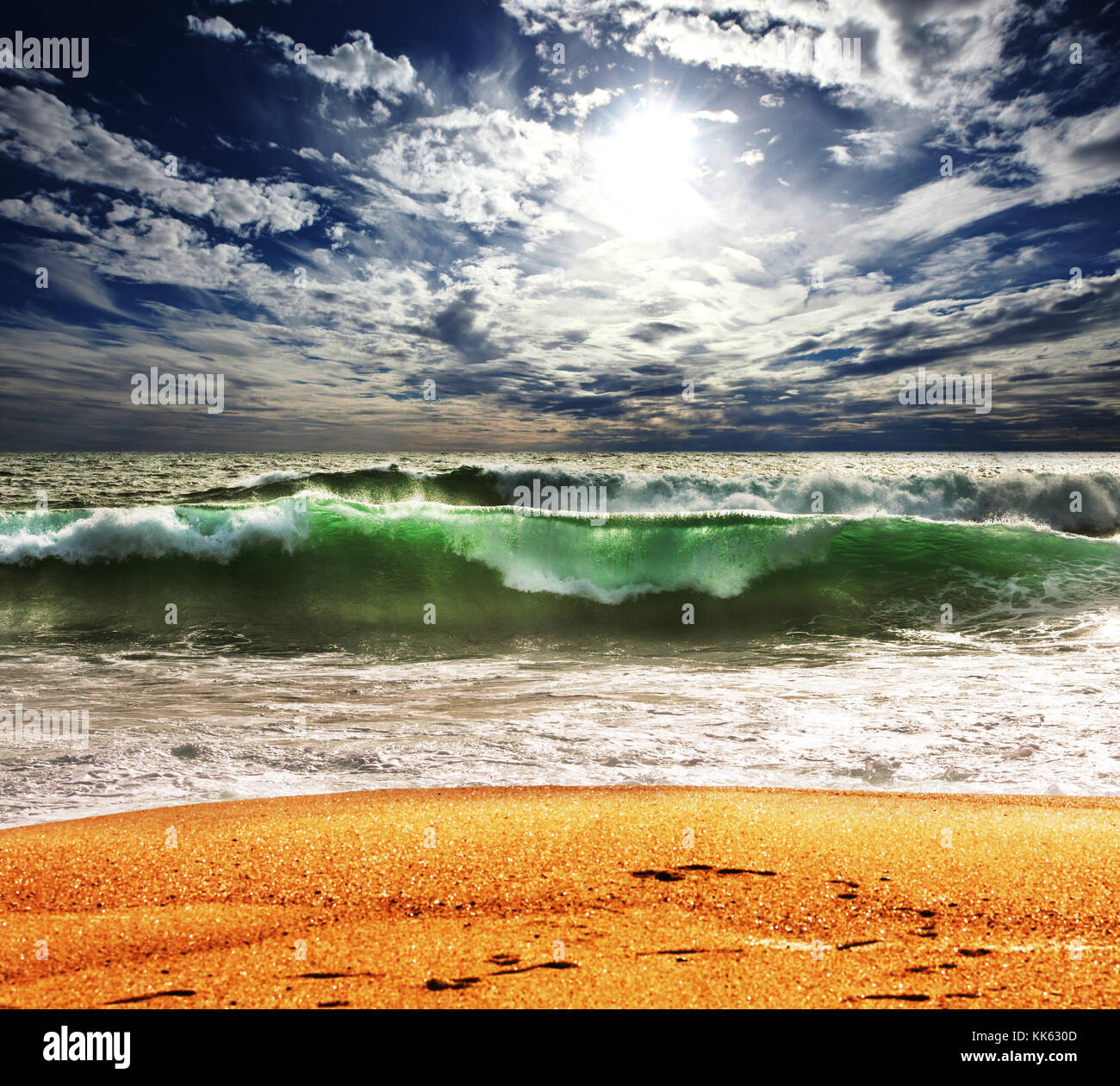 Wave on the beach Stock Photo - Alamy