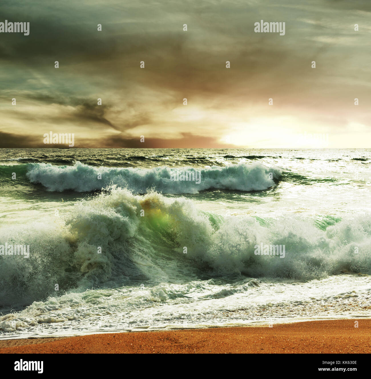 Wave on the beach Stock Photo - Alamy