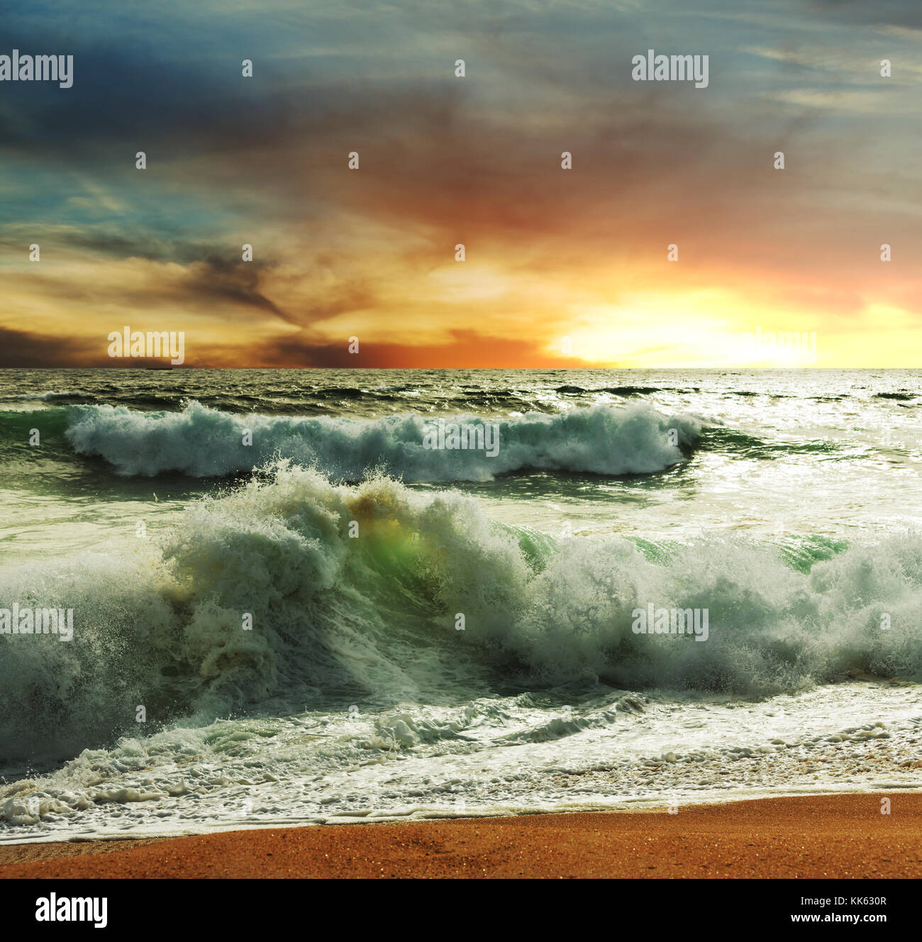 Wave on the beach Stock Photo - Alamy