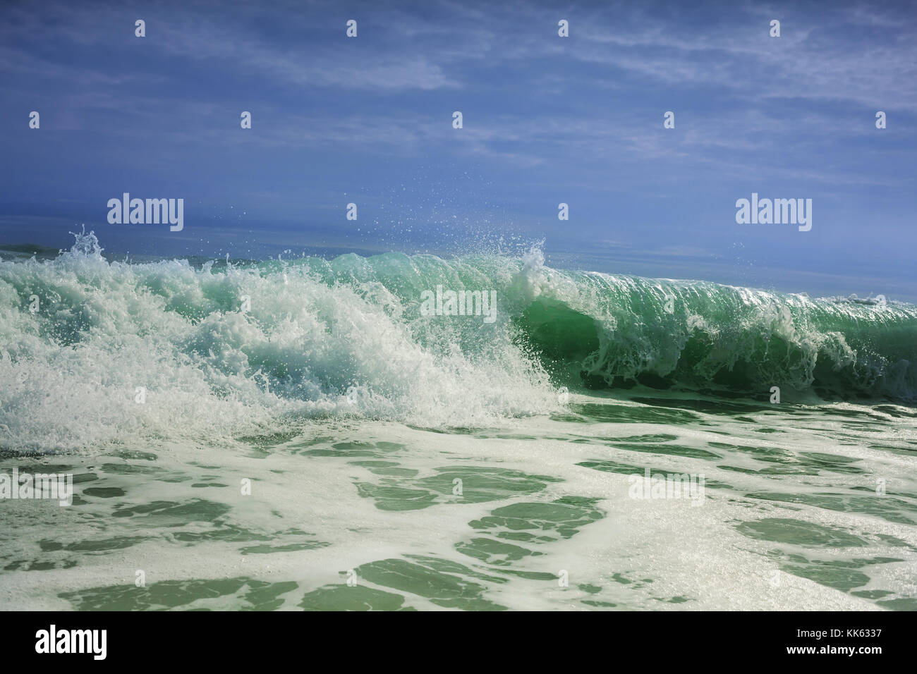 Wave on the beach Stock Photo - Alamy