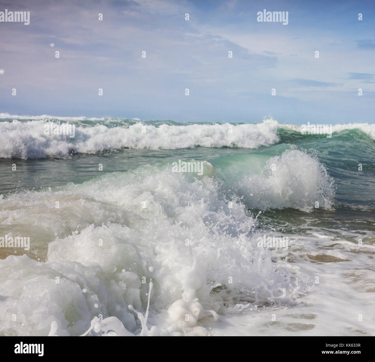 Wave on the beach Stock Photo - Alamy