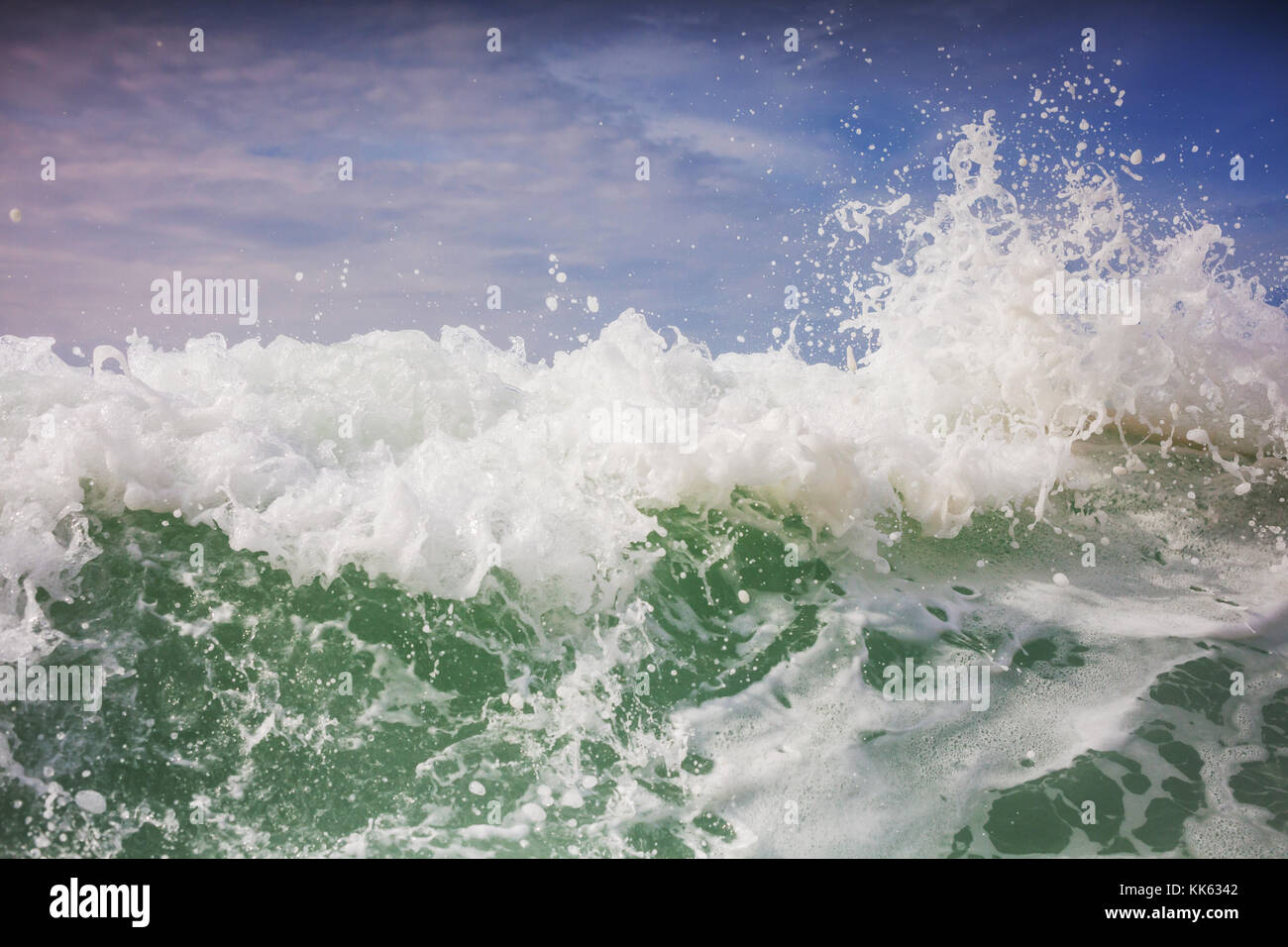 Wave on the beach Stock Photo - Alamy