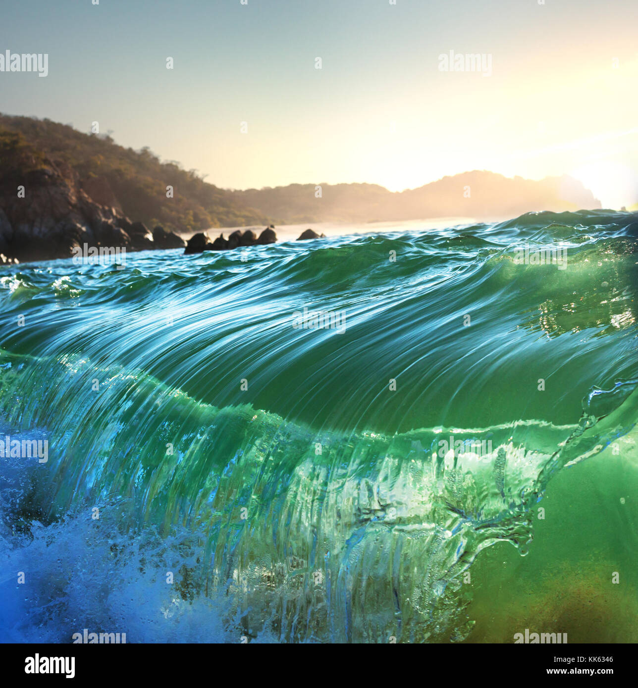 Wave on the beach Stock Photo - Alamy