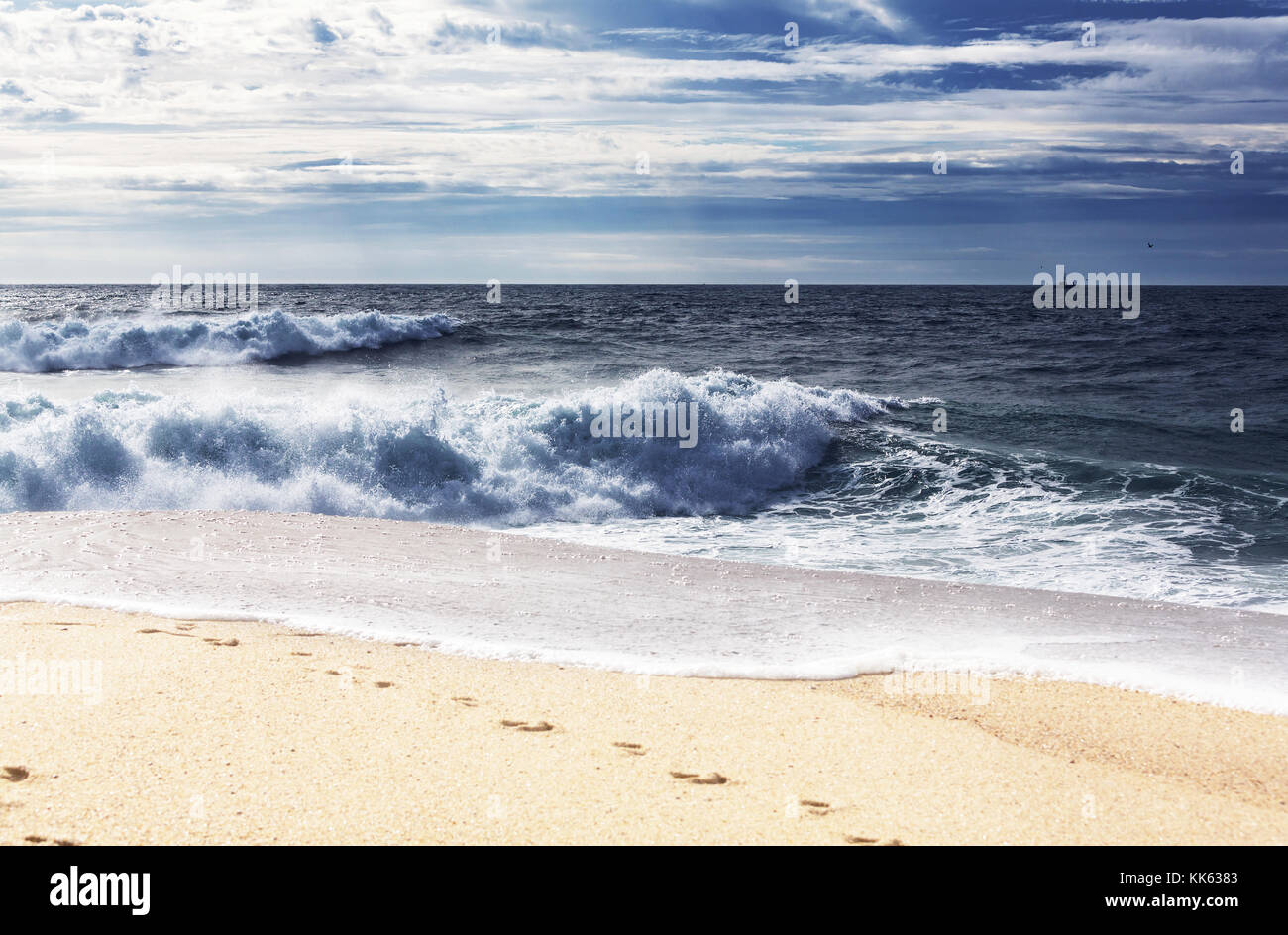 Wave on the beach Stock Photo - Alamy