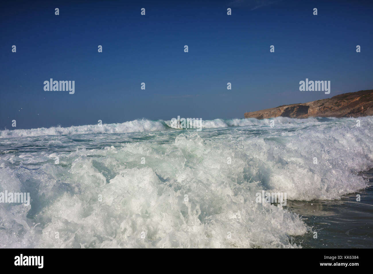 Wave on the beach Stock Photo - Alamy