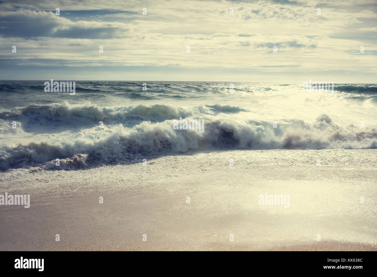 Wave on the beach Stock Photo - Alamy