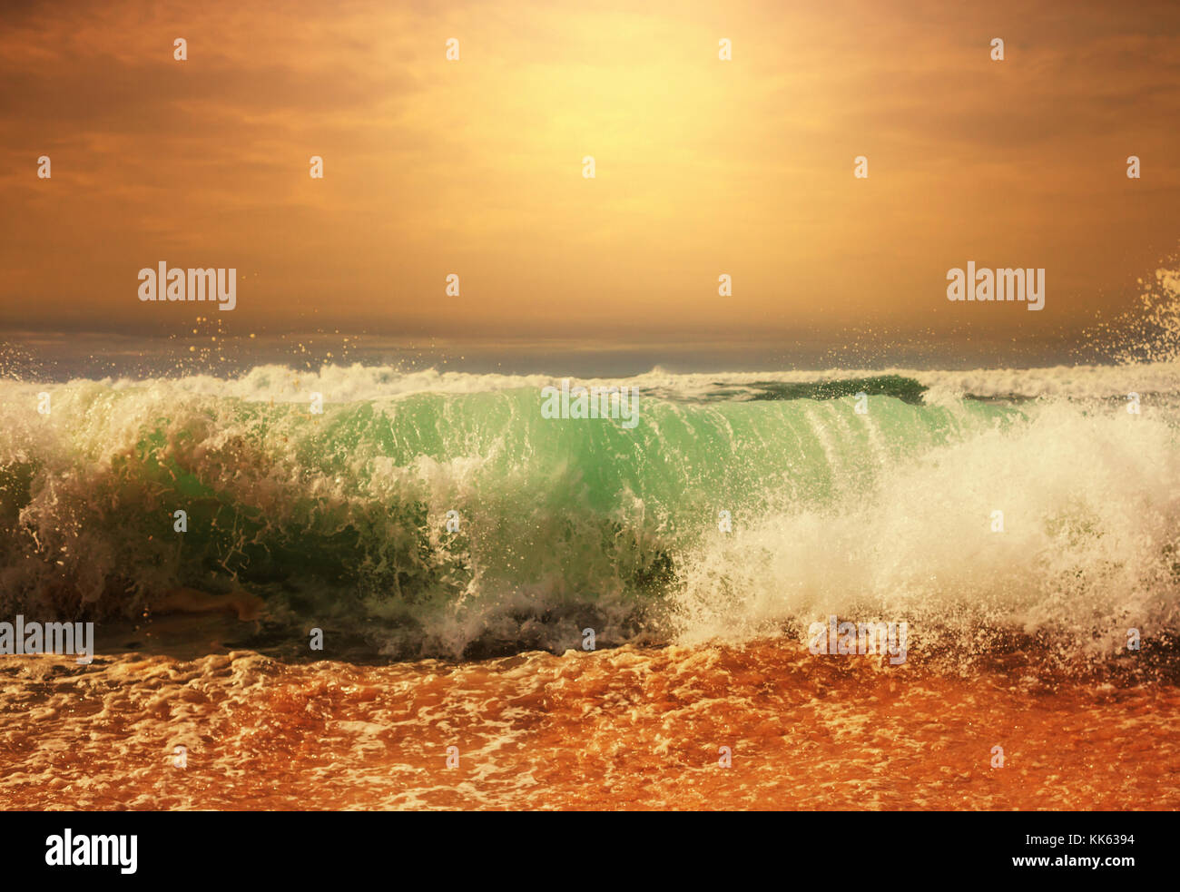 Wave on the beach Stock Photo - Alamy