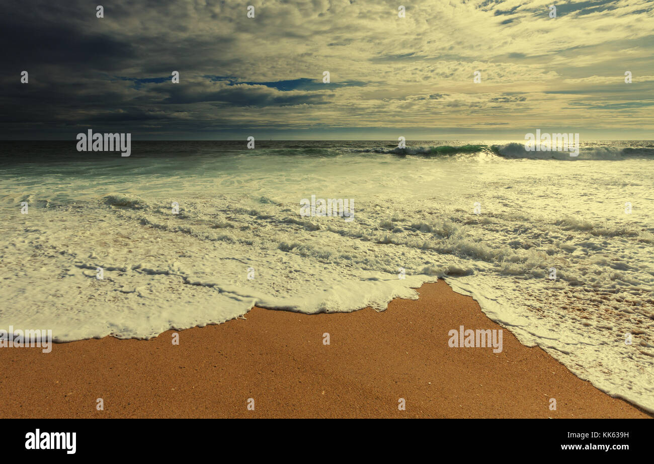 Wave on the beach Stock Photo - Alamy