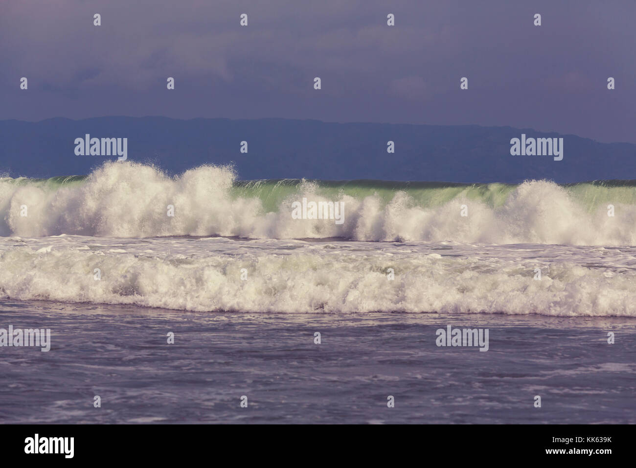 Wave on the beach Stock Photo - Alamy