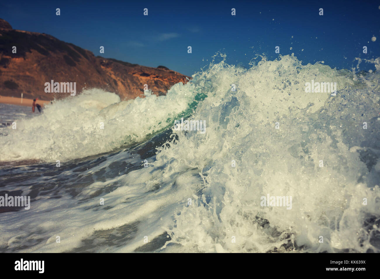 Wave on the beach Stock Photo - Alamy