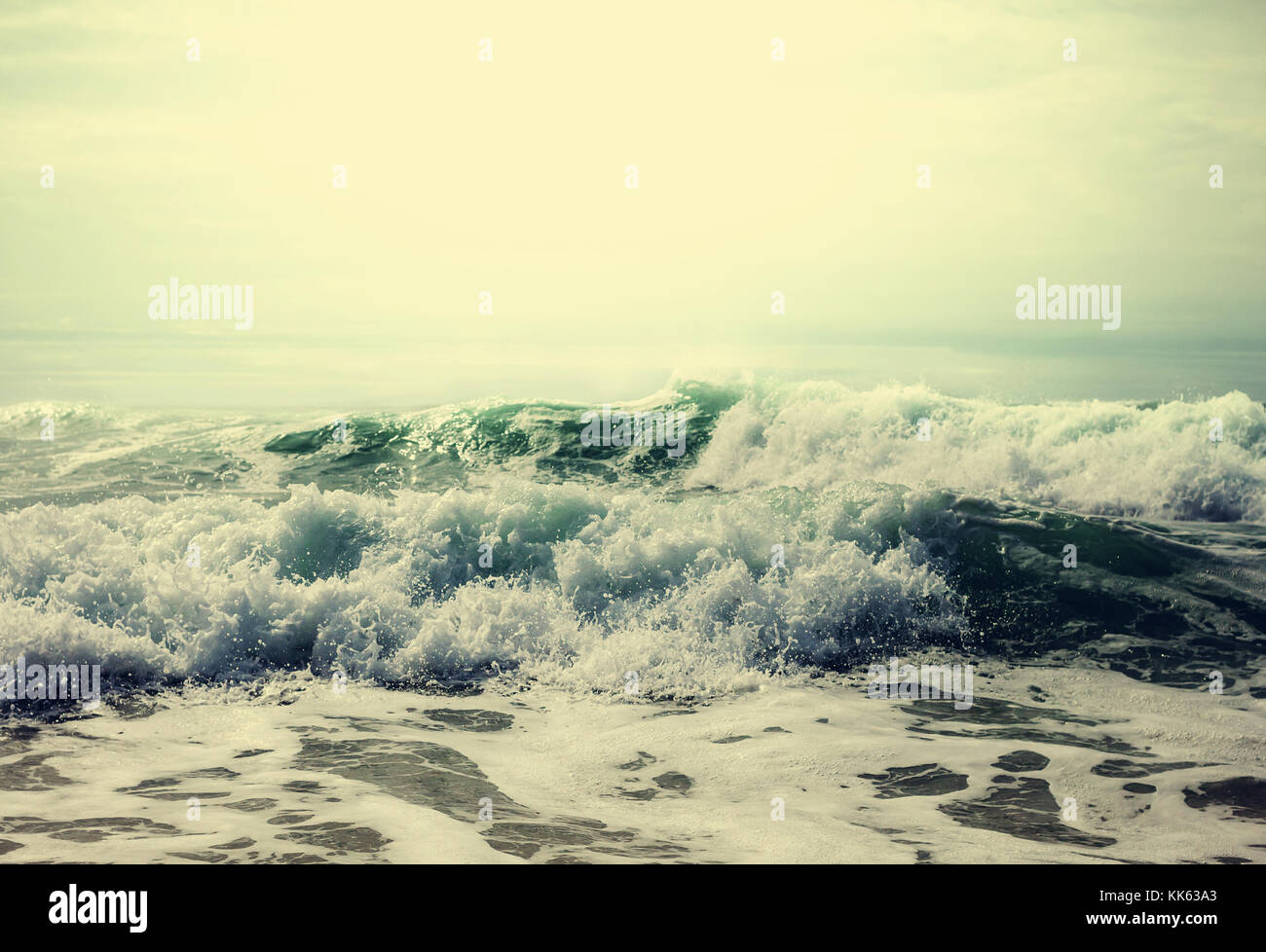 Wave on the beach Stock Photo - Alamy