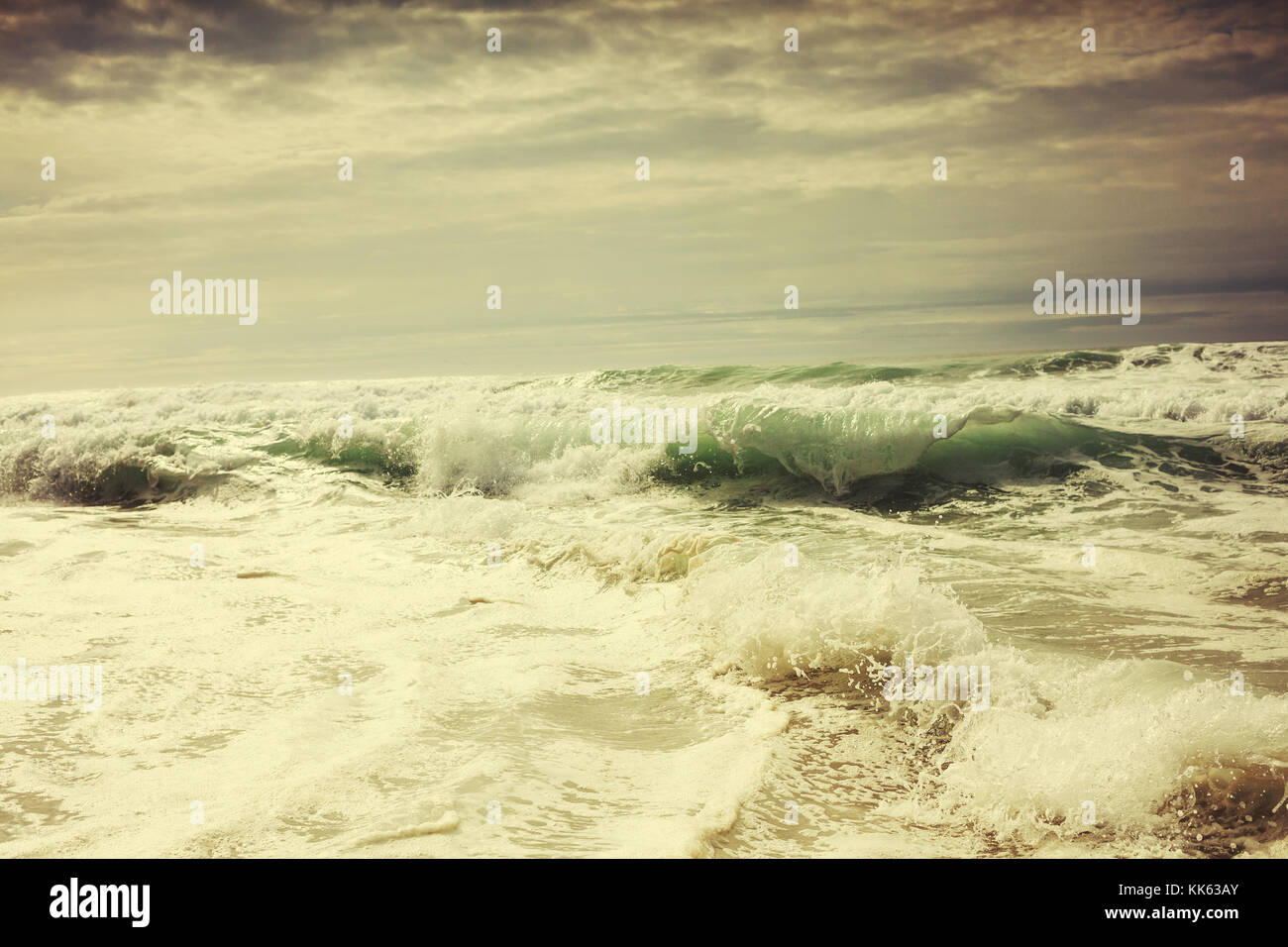 Wave on the beach Stock Photo - Alamy