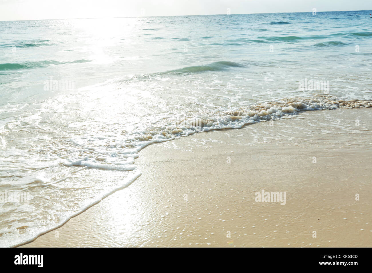 Wave on the beach Stock Photo - Alamy