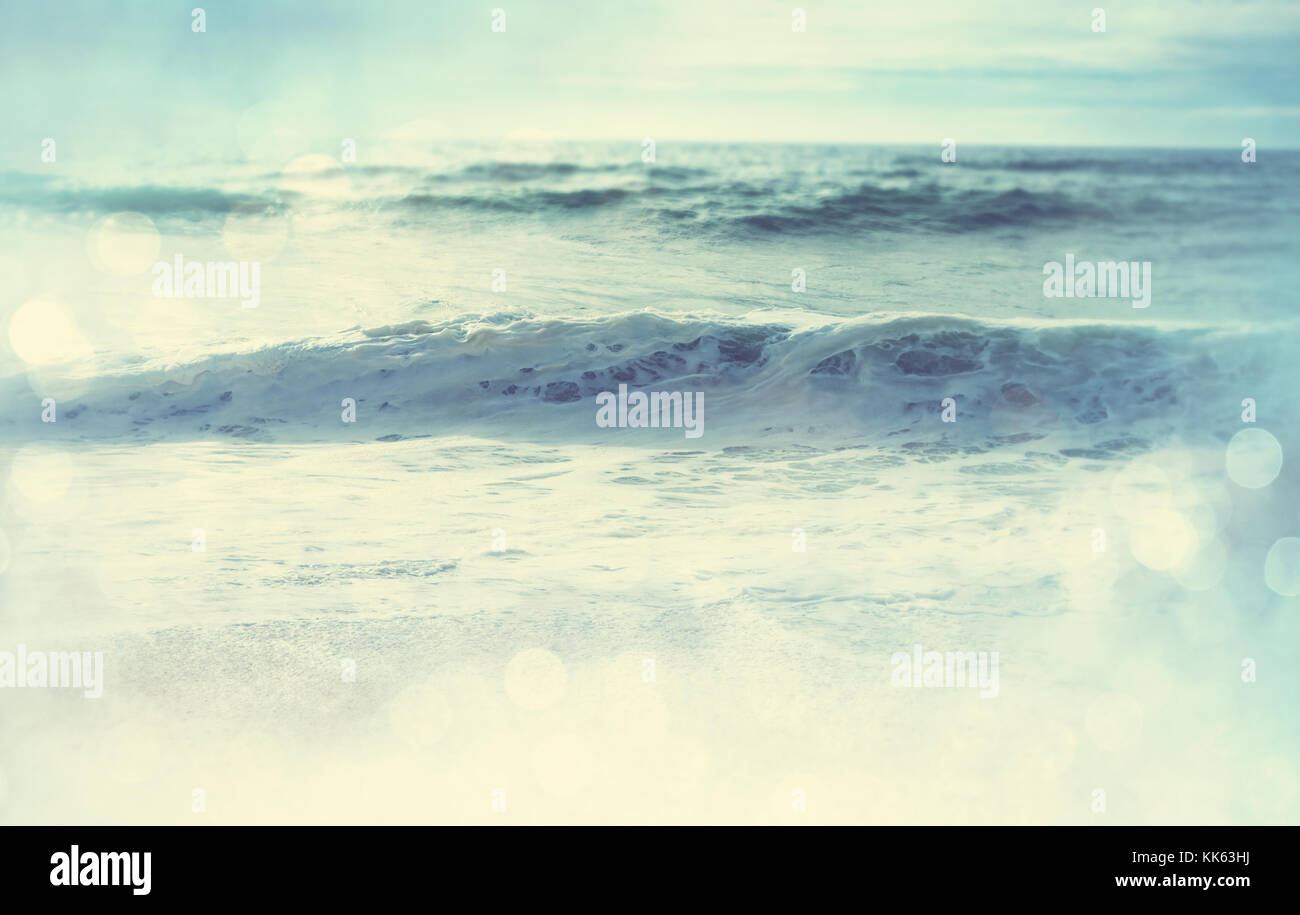 The wave on the beach. Blur background and sunny light. Peaceful nature ...