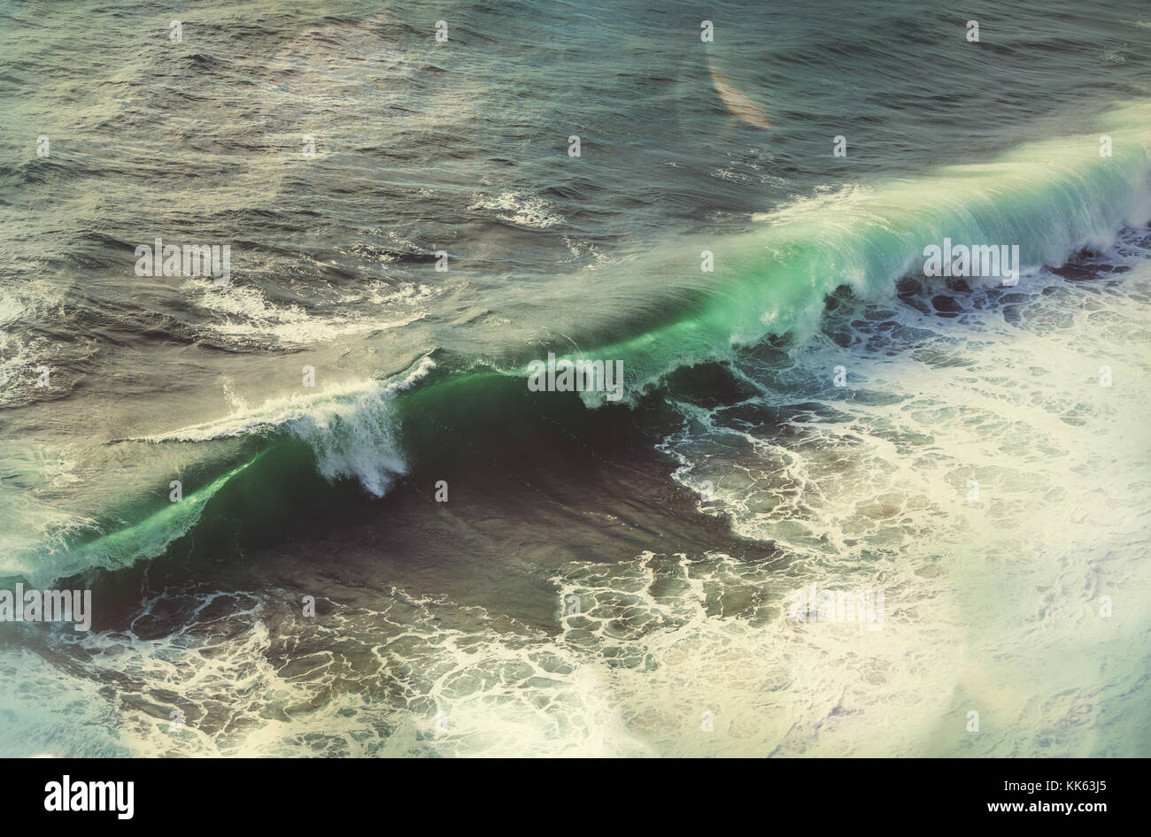 The wave on the beach Stock Photo - Alamy