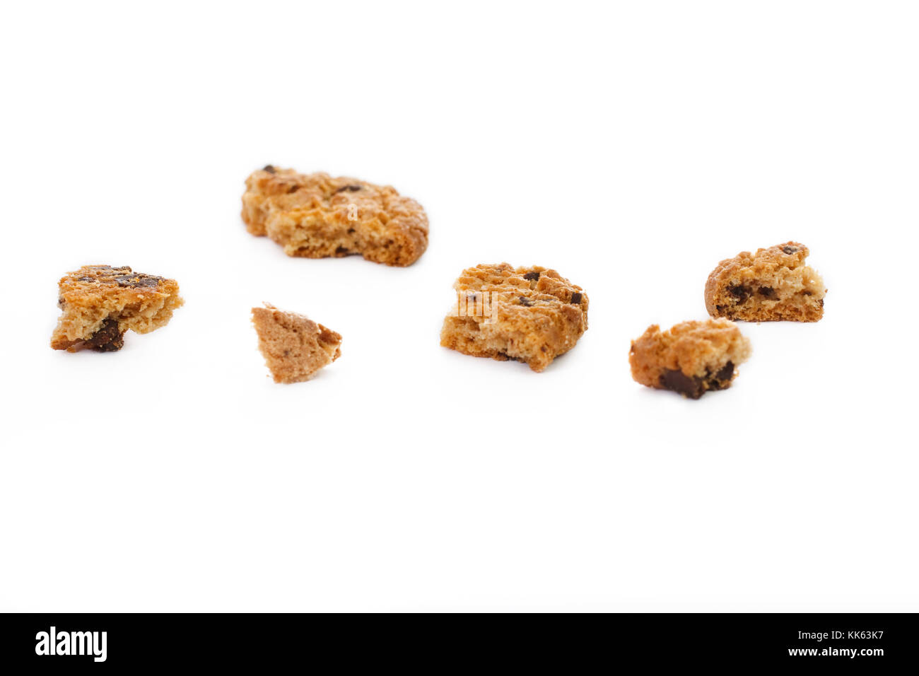 Detail of chip cookie leftovers isolated on white background Stock ...