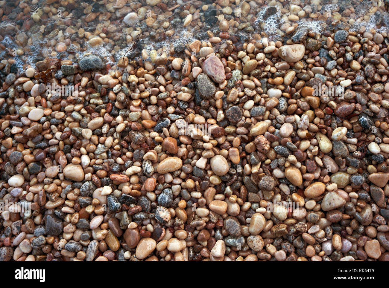 Pebbles on a beach Stock Photo - Alamy