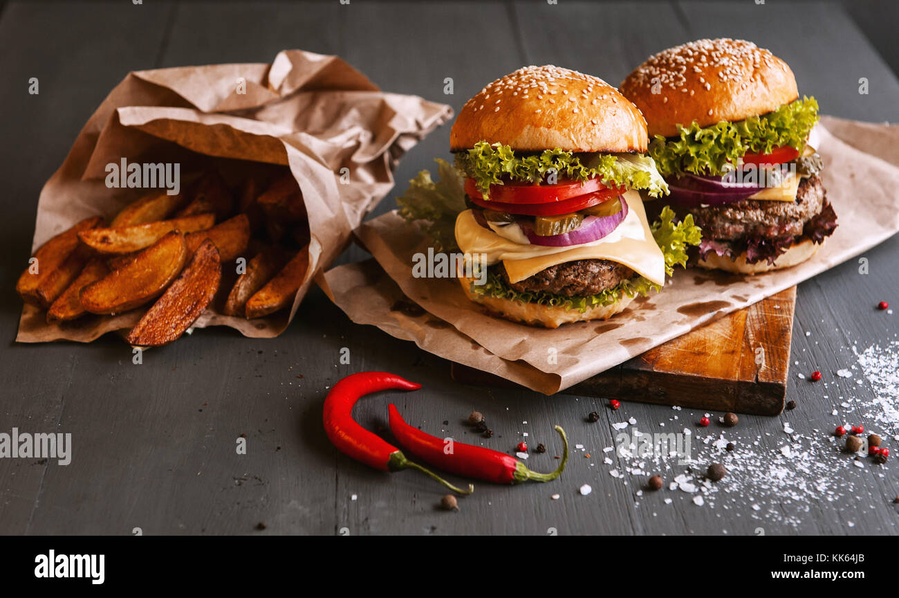 Two mouth-watering, delicious homemade burger used to chop beef. on the ...