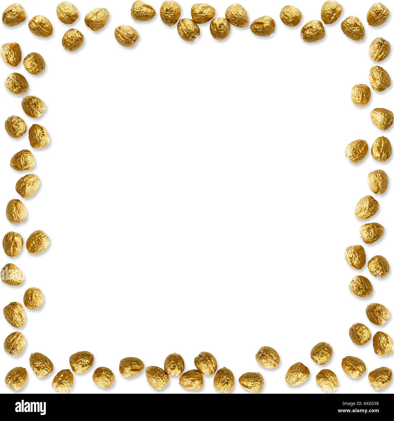 Frame of golden nuts isolated on white background Stock Photo - Alamy
