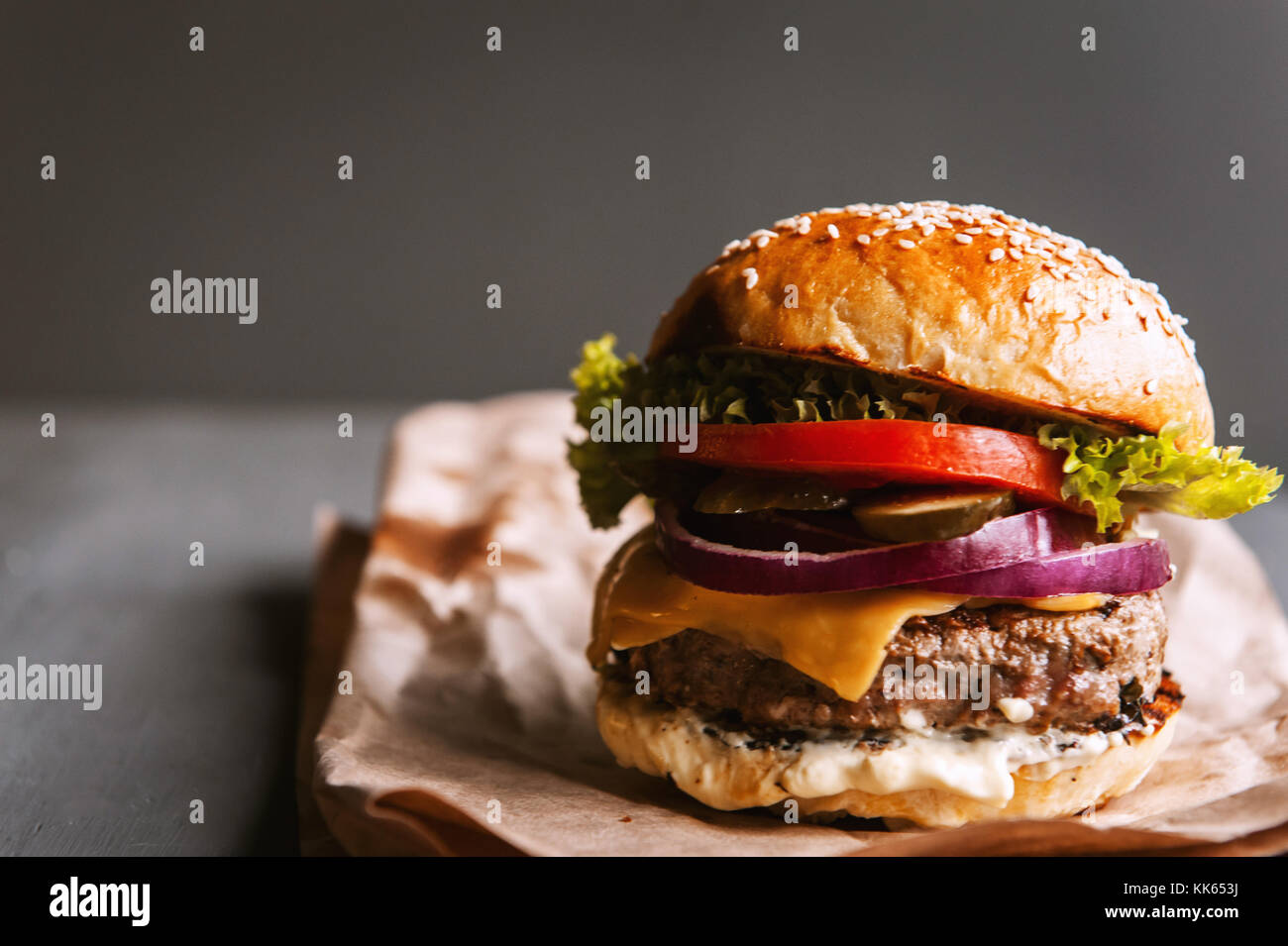 Delicious fresh homemade burger on a wooden table Stock Photo - Alamy
