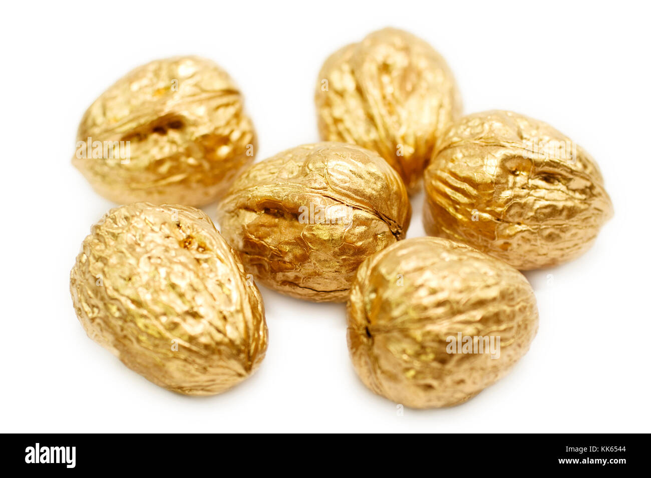 Golden nuts isolated on white background Stock Photo - Alamy