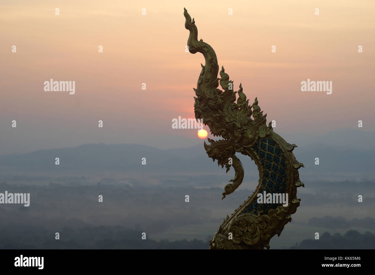 serpent or big snake statue with beautiful sky background Stock Photo ...