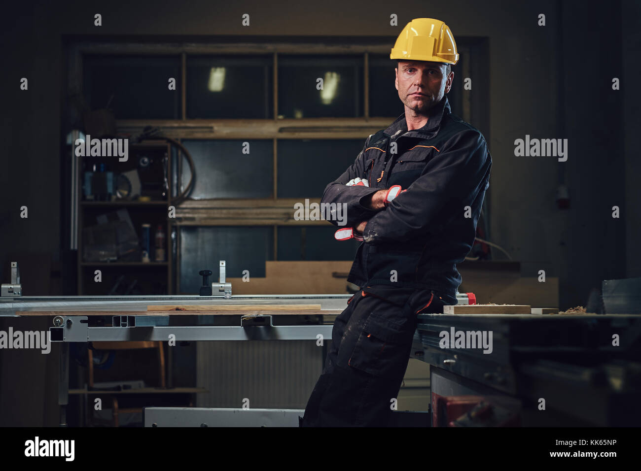 Carpenter male in a workshop Stock Photo - Alamy