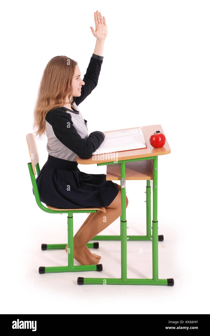 Teenager school girl raising hand to ask question isolated on white ...