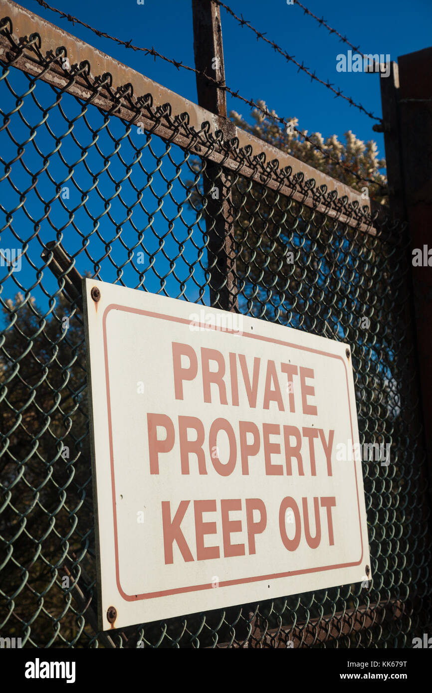 Private Property sign on chain fence, Scotland Stock Photo - Alamy