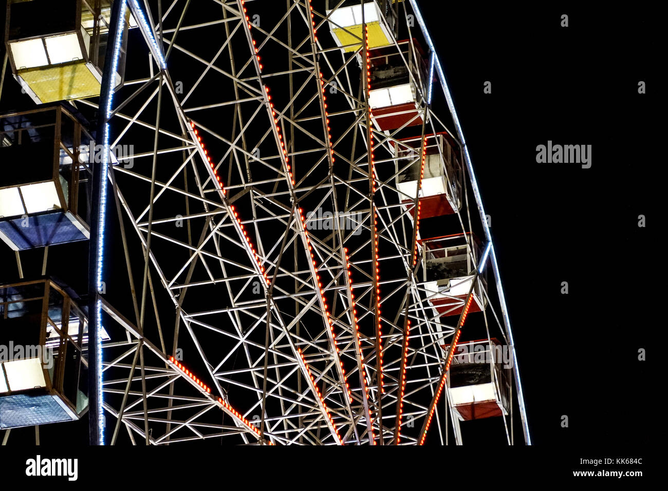 detail of a night-time panorama wheel lit by lights Stock Photo - Alamy