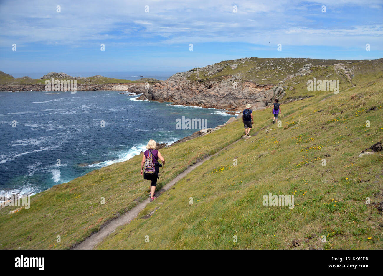 Three Hikers on Coastal Path in Hell Bay Walking to Shipman Head on ...