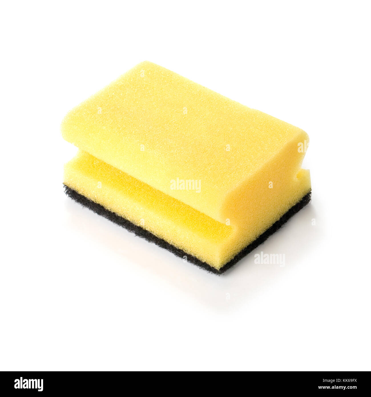 yellow household sponge on a white background Stock Photo - Alamy