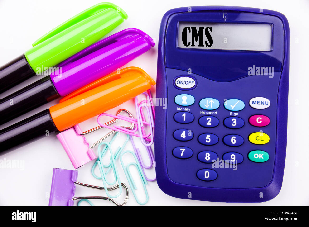 Writing word CMS text in the office with surroundings such as marker ...