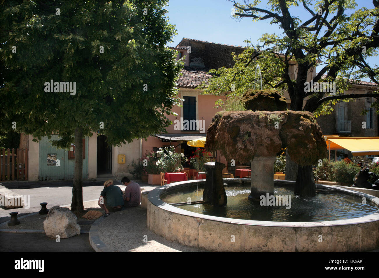 Vaugines, Vaucluse, Provence, France: the ancient village fountain in ...