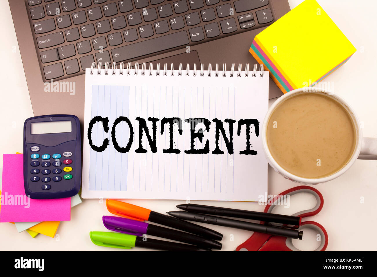 Word writing Content in the office with laptop, marker, pen, stationery ...