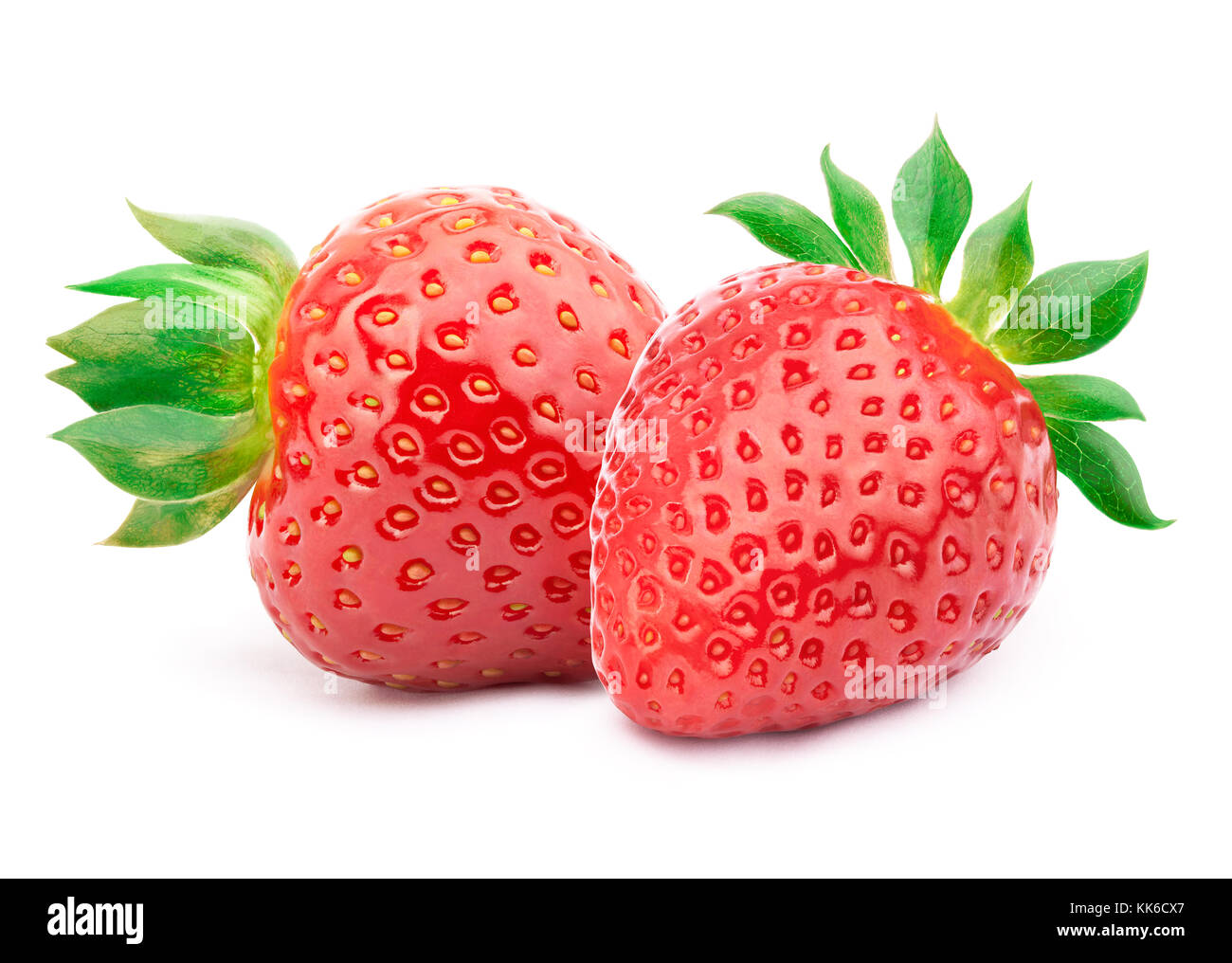 Two strawberries with leaves isolated Stock Photo - Alamy
