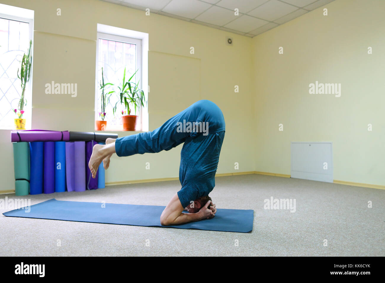 Beautiful young American performs asanas from yoga Stock Photo - Alamy