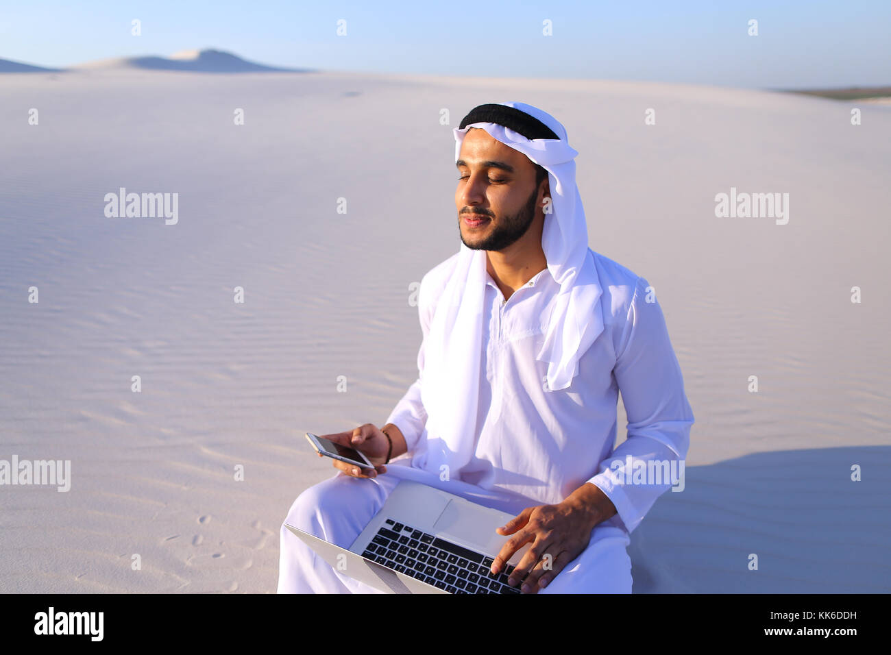 Emirati guy professional designer with computer projects project Stock ...