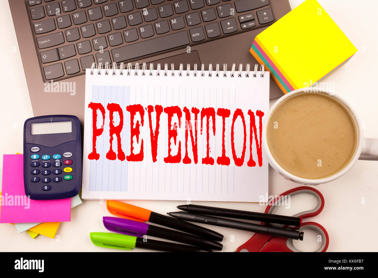 Word writing Prevention in the office with laptop, marker, pen ...