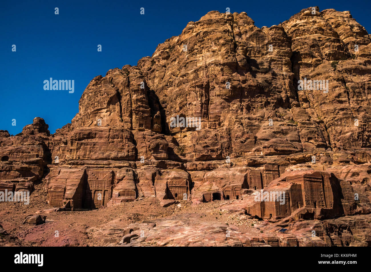 Nabataean tombs carved into the cliff side in southern part of ancient ...