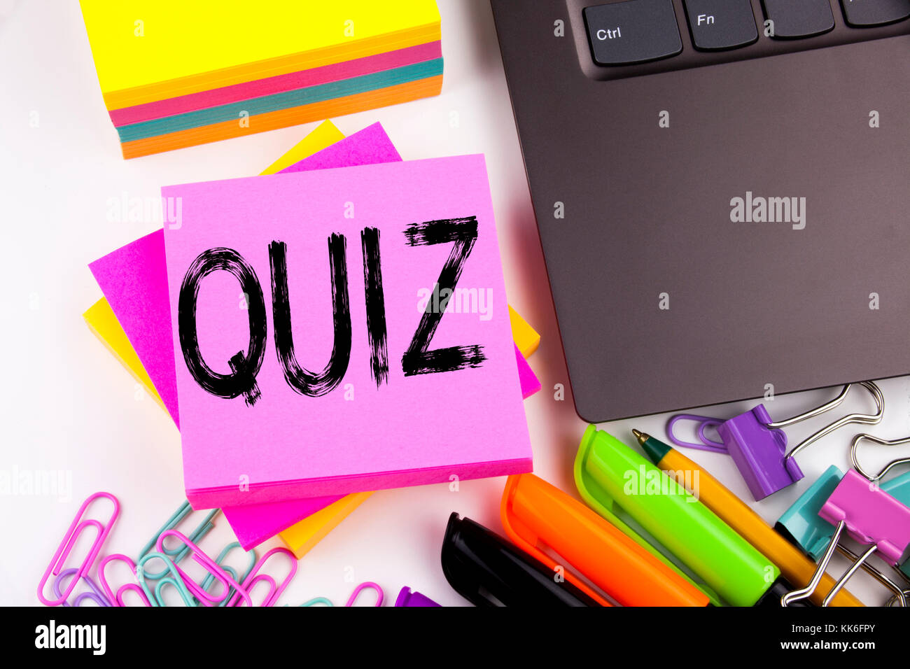 Writing text showing Quiz made in the office with surroundings such as ...