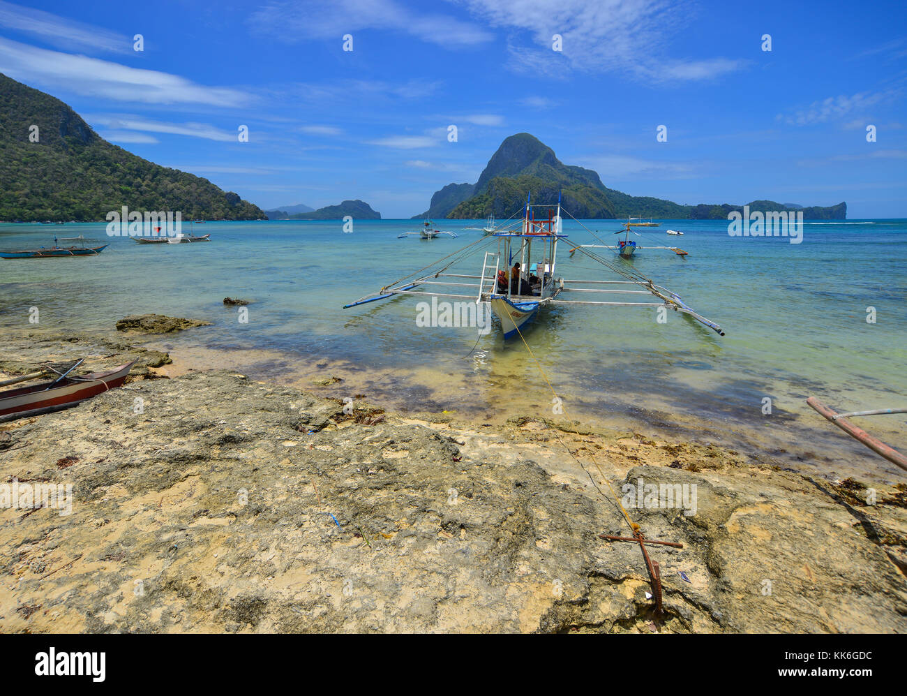 Coron, Philippines - Apr 4, 2017. Wooden boats docking on the sea in ...