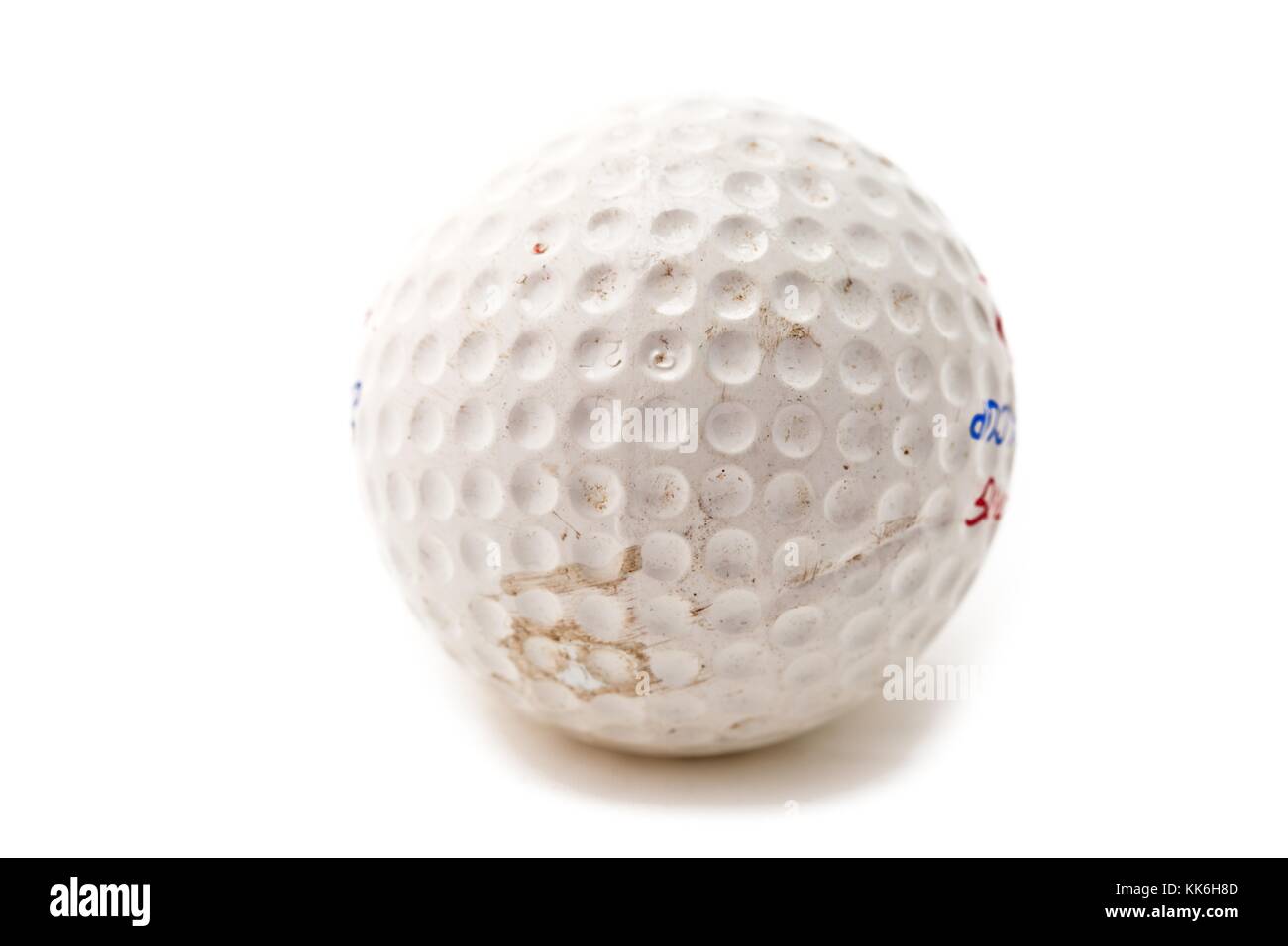 close up image of a dirty golf ball Stock Photo - Alamy